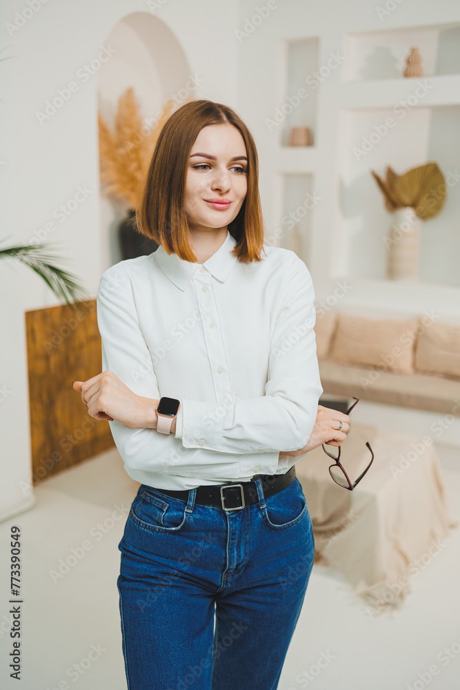 Cute woman in glasses in open space, coworking office, relaxing ...