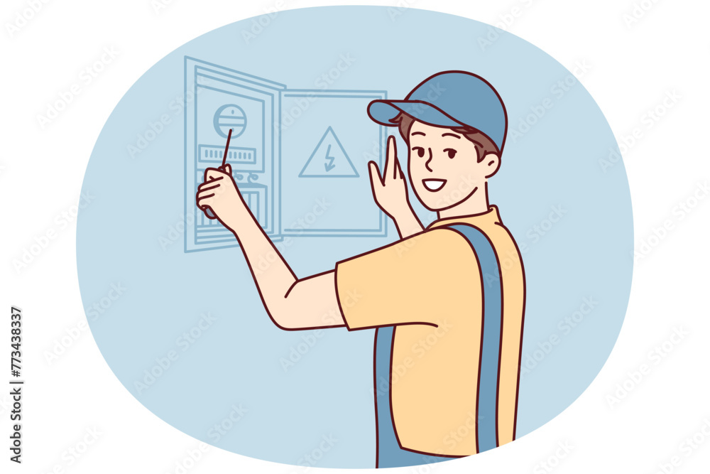 Man electrician is engaged in repair electrical appliances by opening ...