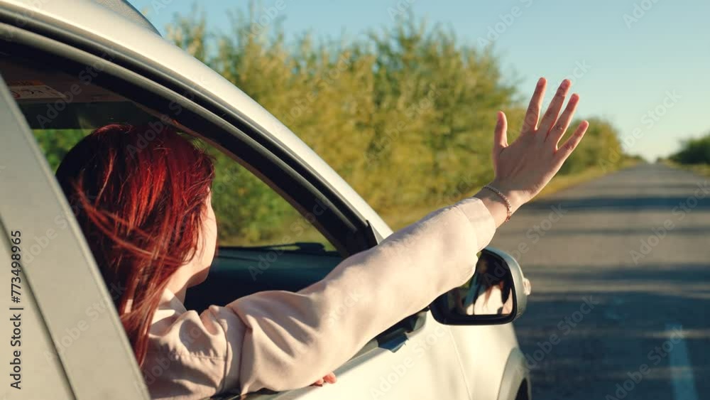 Vídeo do Stock: girl rides car with her hand out window, traveling ...