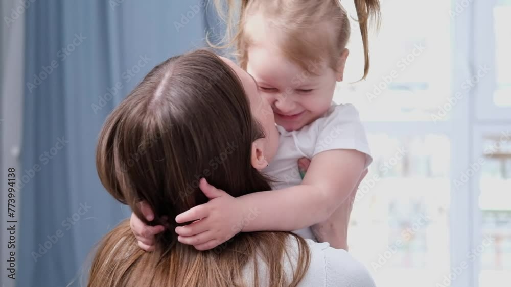 Happy family. Baby girl feet walk on floor towards mother. Child ...