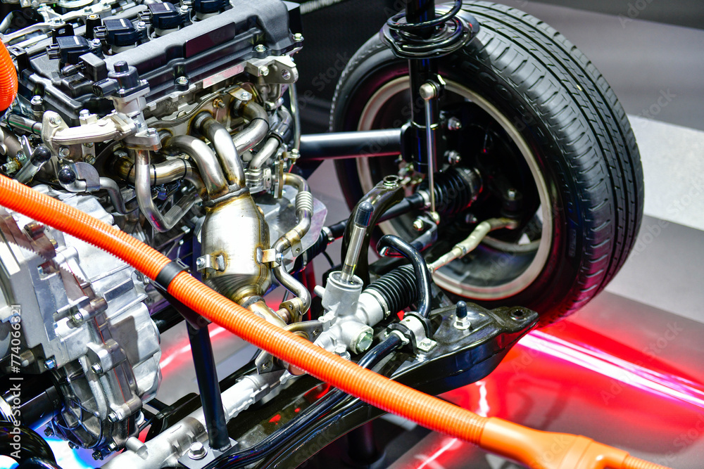 The prototype of a hybrid engine consists of a motor, a control unit ...