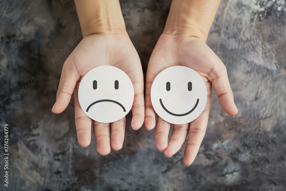 Customer Satisfaction Survey with Emoticon Choices. Two hands ...