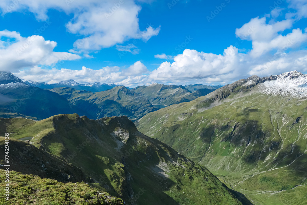 Panoramic view of majestic snow capped mountain peaks in Glockner group ...