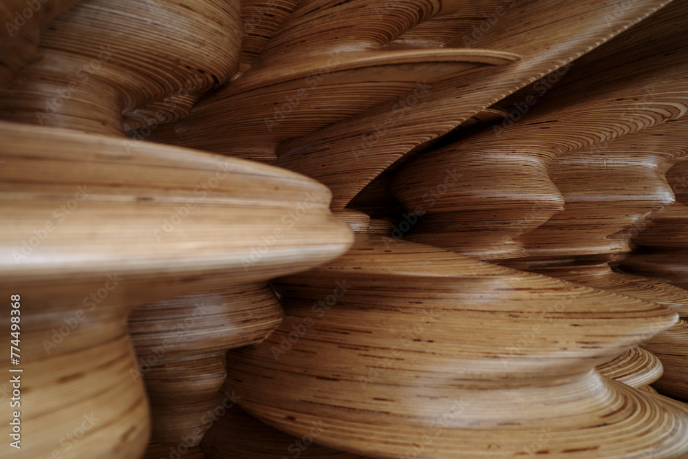 A close-up view of a complex, sculptural wooden structure with ...