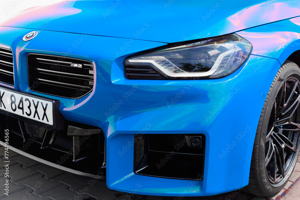 Front of the blue BMW M2 Coupe. Model G87. Close up. Model G87. Engine ...
