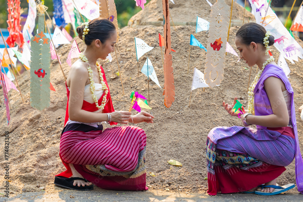 Songkran festival. Northern Thai people in Traditional clothes dressing ...