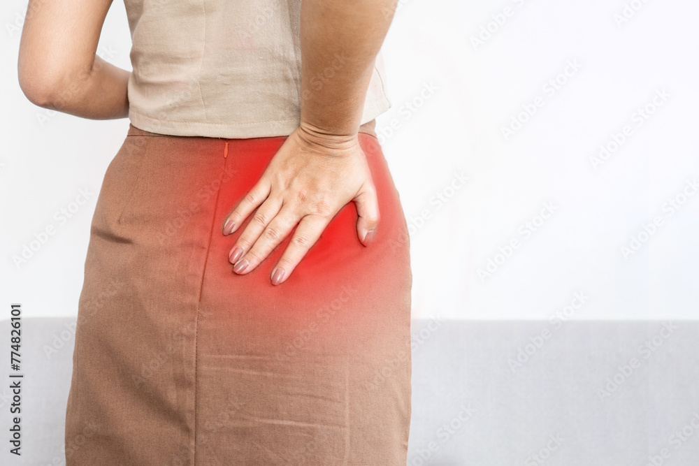 woman suffering from Piriformis Syndrome , feeling pain and numbness in ...