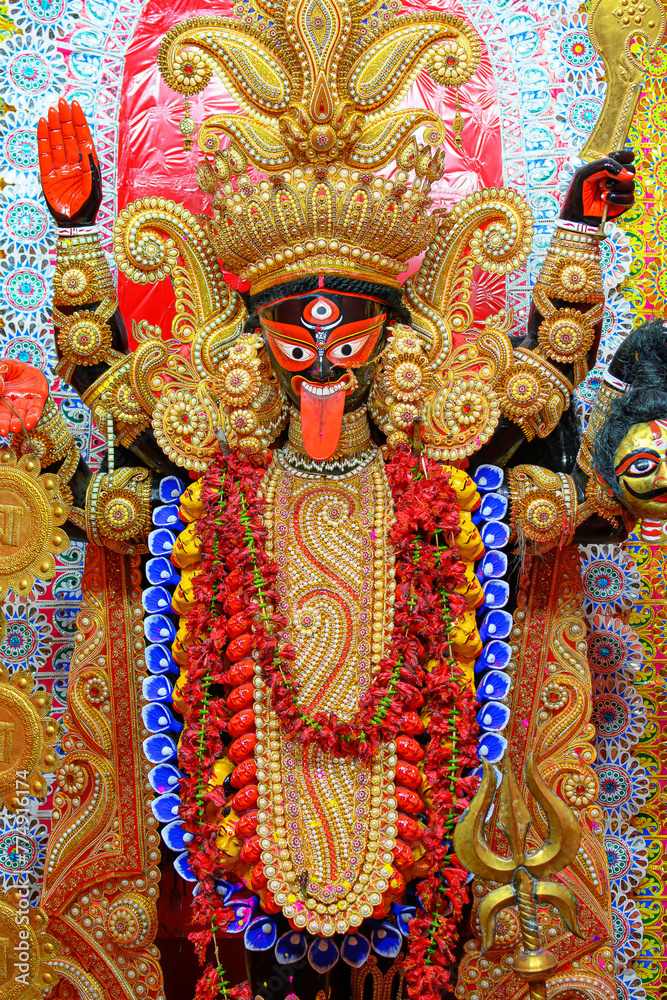 Idol of Goddess Maa Kali at a decorated puja pandal in Kolkata, West ...