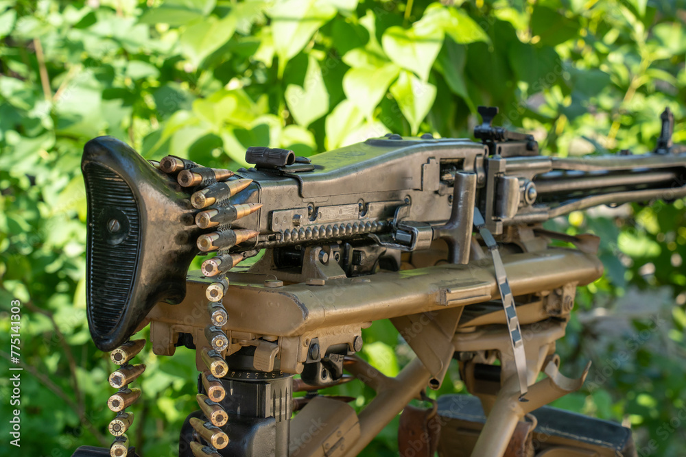 Second World War German MG 42 machine gun with ammunition belt mounted ...