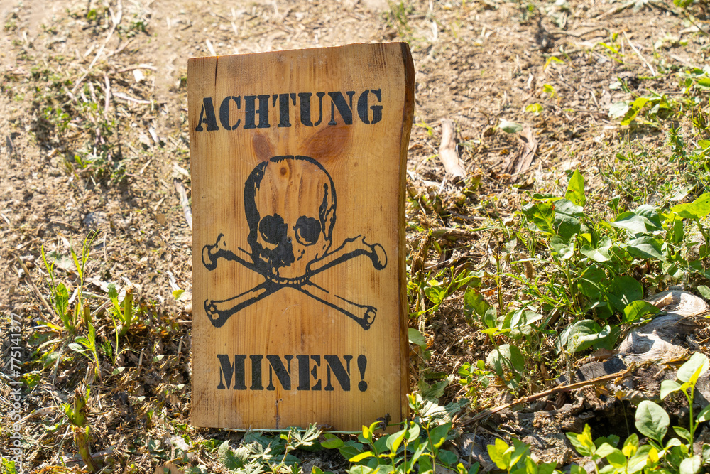 World War II minefield warning wooden sign with German inscription and ...