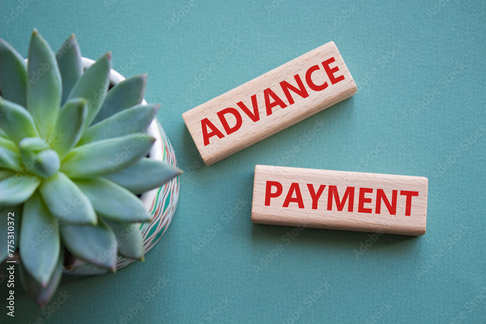 Advance Payment symbol. Concept words Advance Payment on wooden blocks ...