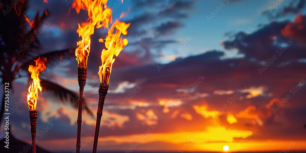 Hawaii luau party Maui fire tiki torches with open flames burning at ...