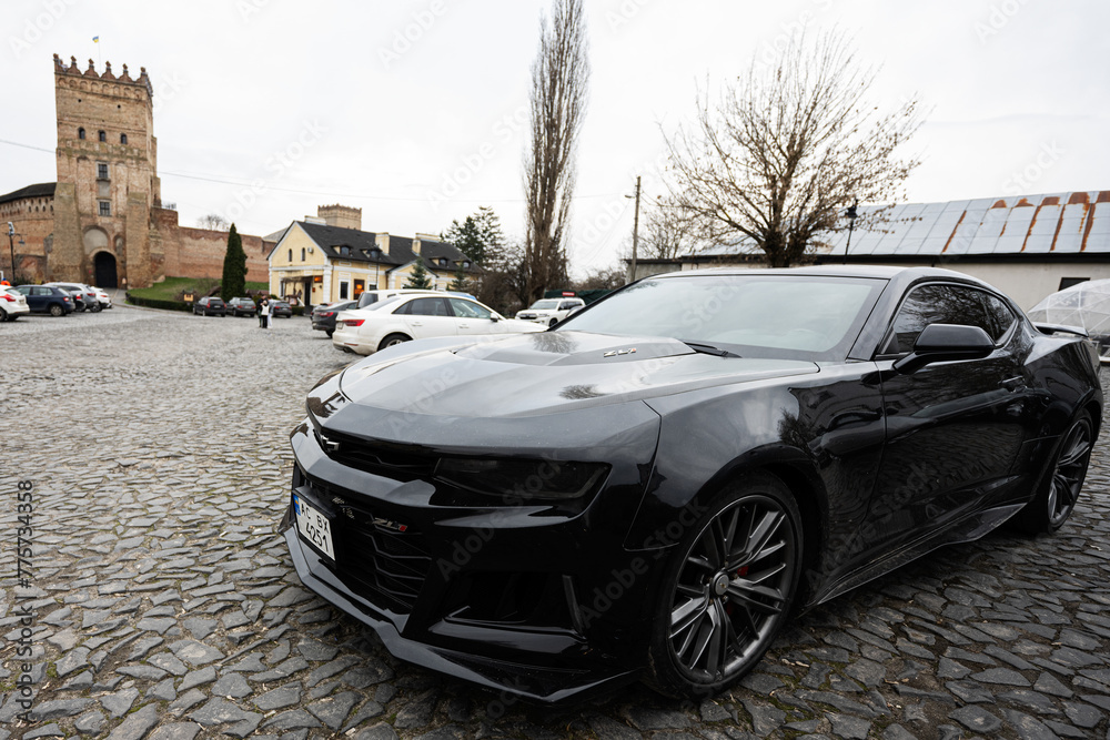 Lutsk, Ukraine - March, 2024: Black sports car Chevrolet Camaro ZL1 in ...