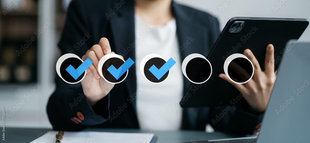 Business performance checklist concept, businessman using tablet and ...