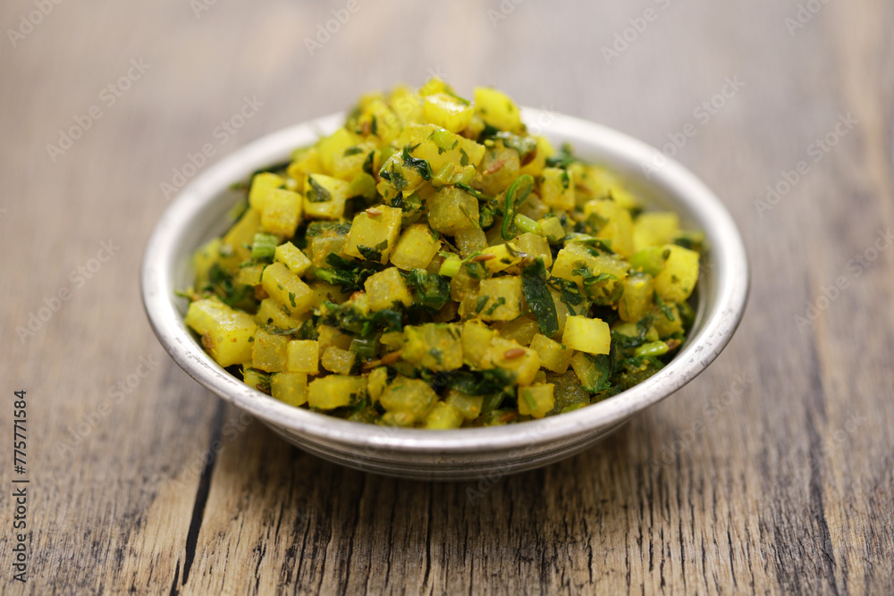 mooli ki sabzi, Indian-style cooked white radish. Stock Photo | Adobe Stock