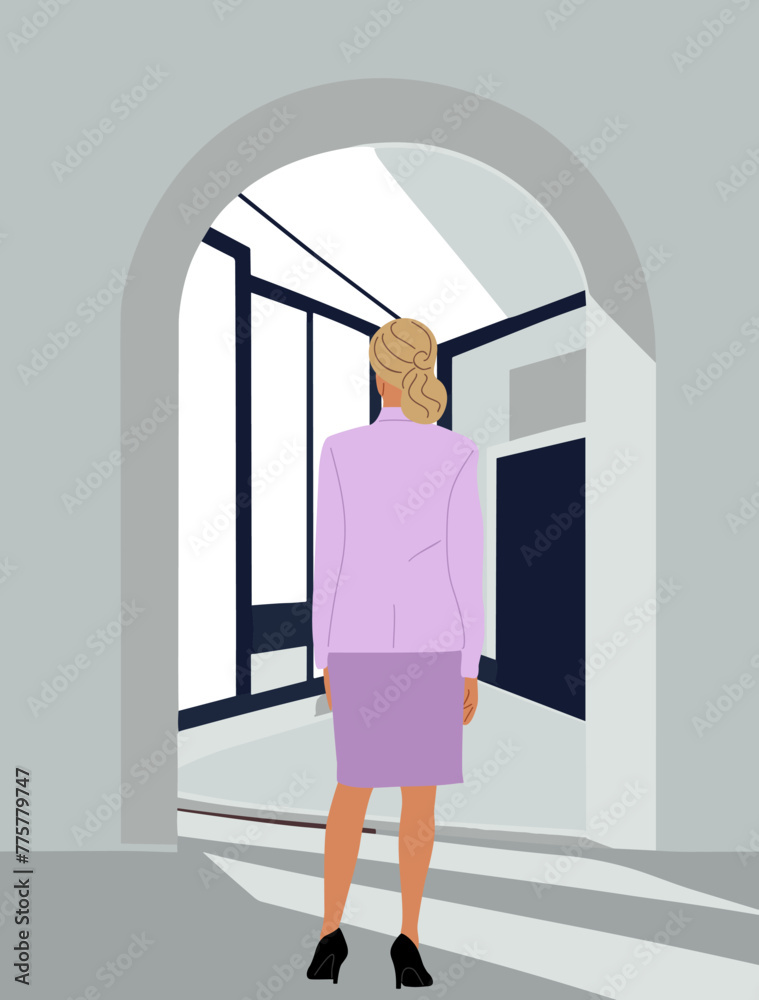 Business woman standing rear view in modern office entrance. Pretty ...