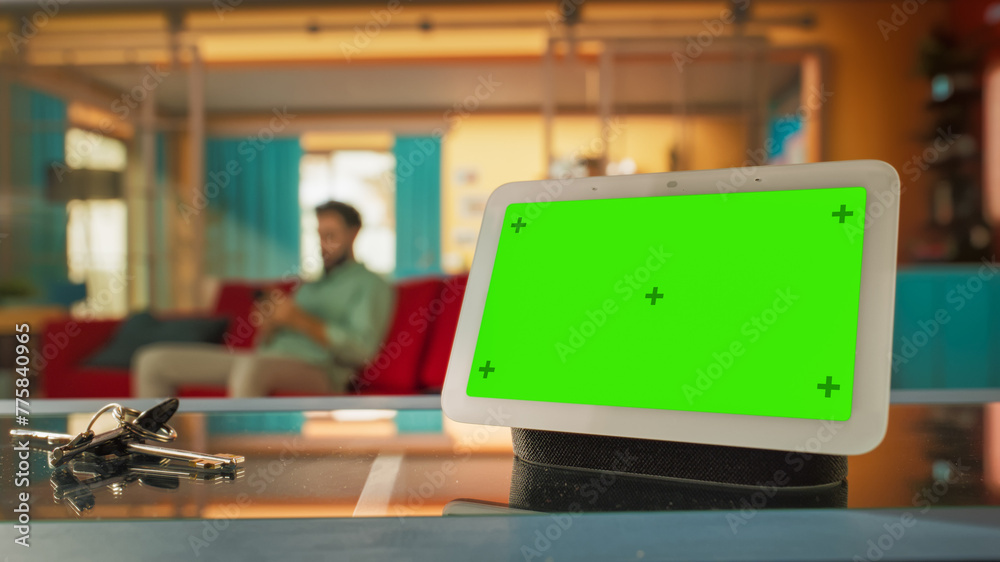 Creative Smart Home Device with Green Screen Display. In the Background ...