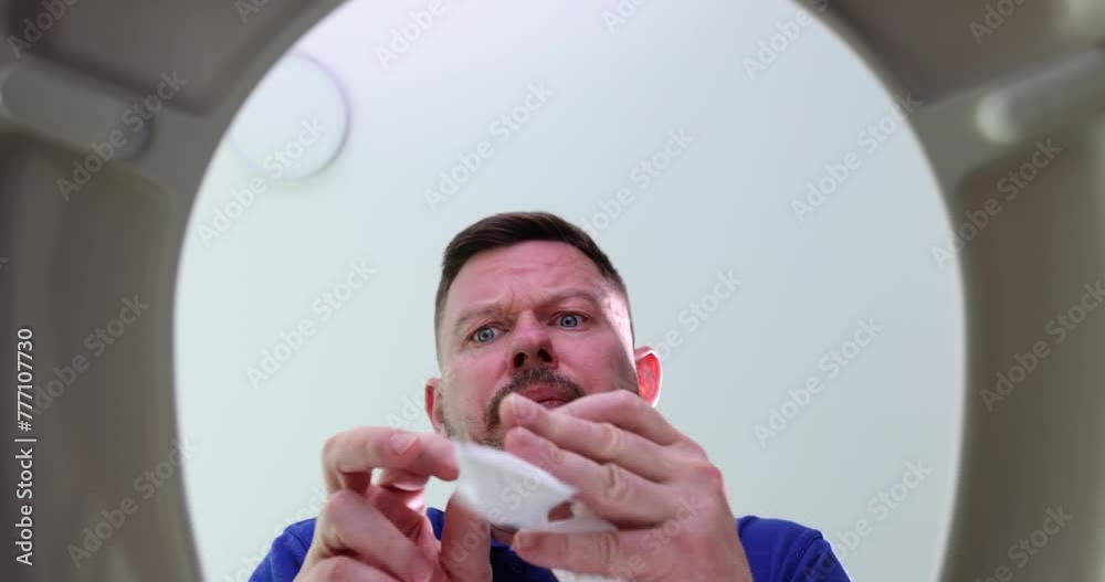 Frightened male drug addict throwing sachets of cocaine into toilet 4k ...