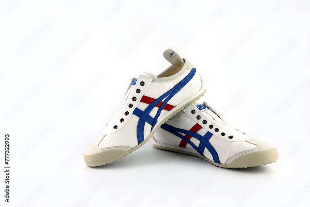 red and blue signature stripe on white color Onitsuka Tiger sneaker ...