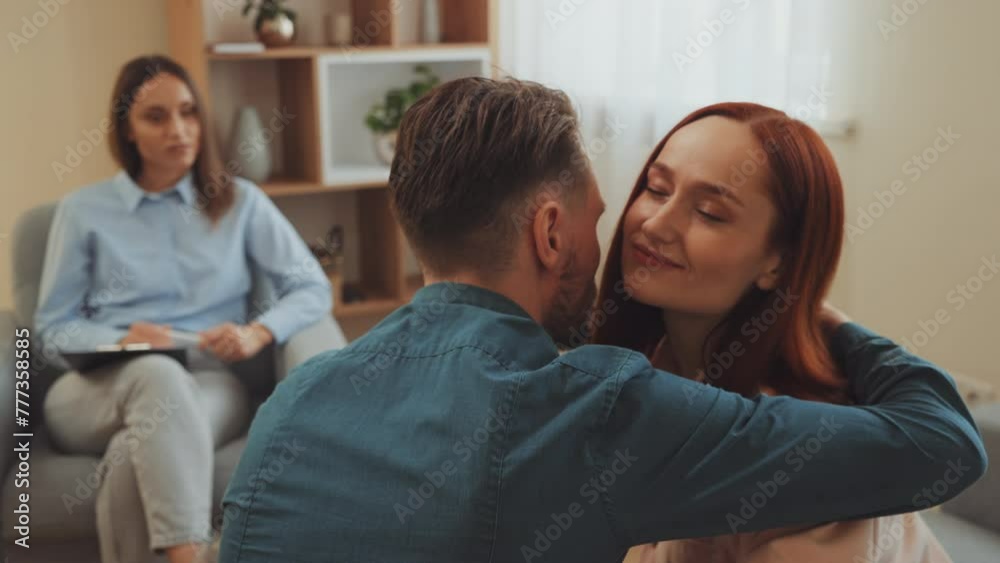 Tender moment of reconciliation between couple as they embrace ...
