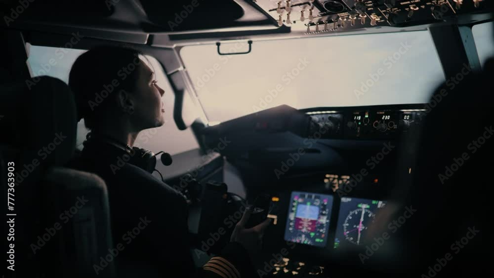 A woman pilot is flying in the cockpit. The pilot makes a sharp turn to ...