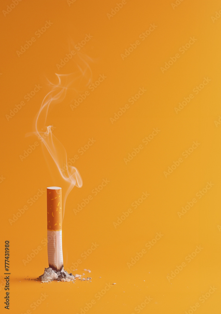 smoking cigarette butt stubbed out on plain color yellow studio ...