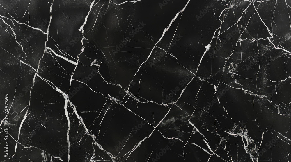 A high-end black marble texture with a matte finish and random patterns ...
