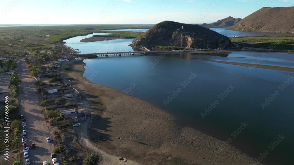aerial view of the bridge that connects El Maviri Island with land in ...