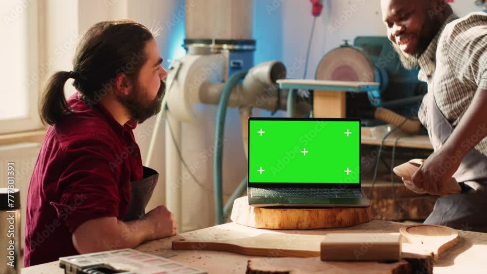 Upbeat men using CAD software on isolated screen laptop, debating wood ...