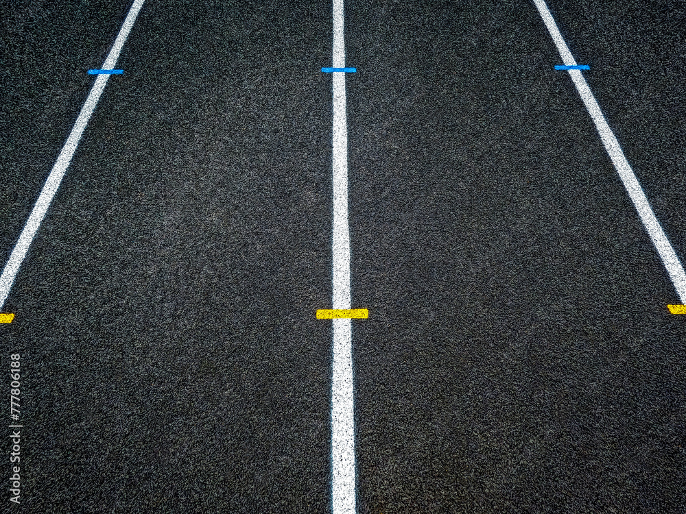 Track and Field Running Lanes. Overhead view of a rubber black running ...