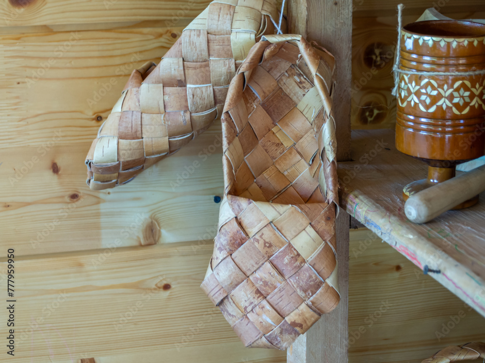 Woven bast shoes made of birch bark. Rustic shoes that people used to ...