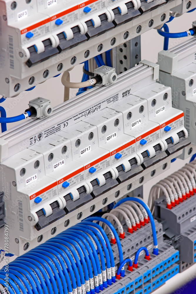 An electric switchboard with modules for protection and control of ...