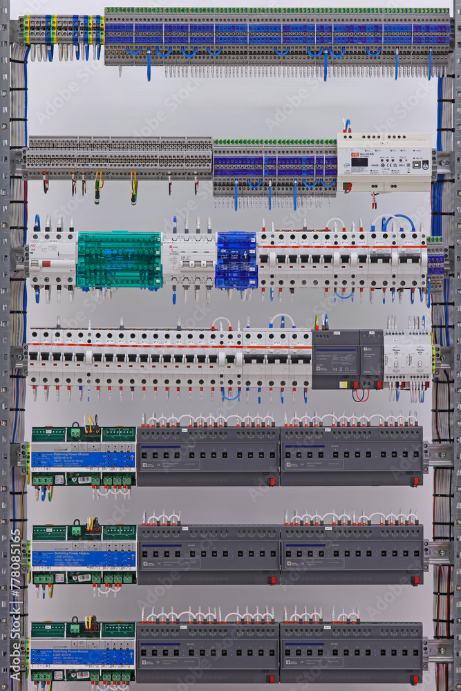 An electric switchboard with modules for protection and control of ...