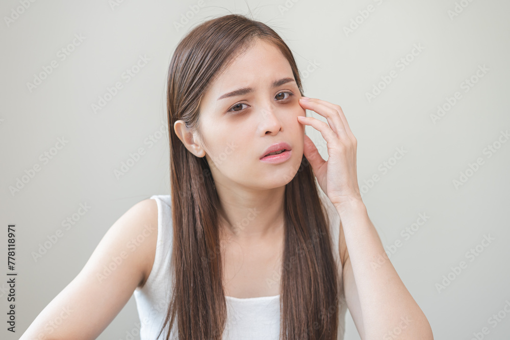 Bored, insomnia asian young woman, girl looking at camera, hand ...