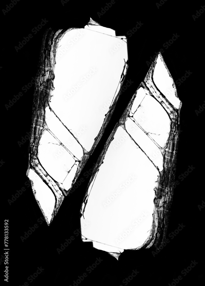 teared rag spread isolated on black background. isolated on black ...