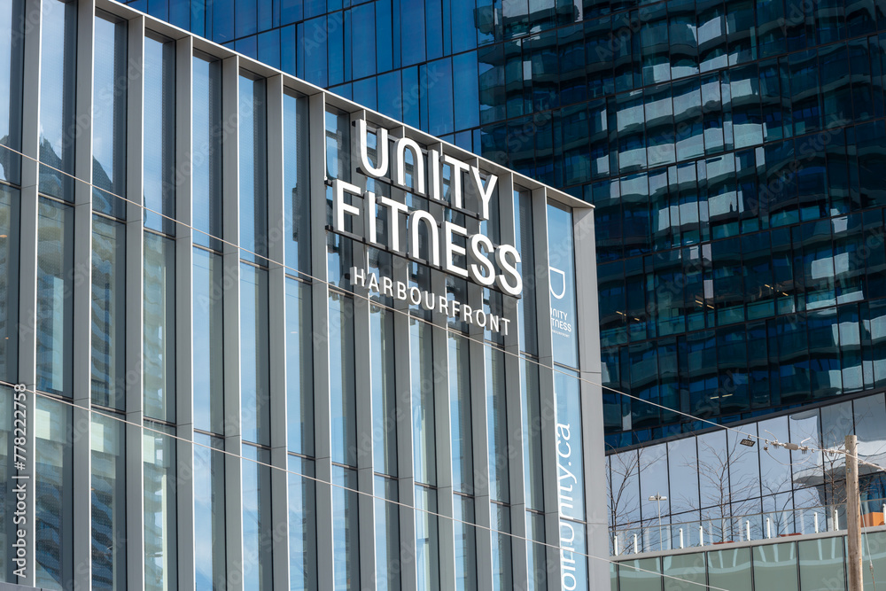 exterior building facade and sign of UNITY Fitness Harbourfront located ...