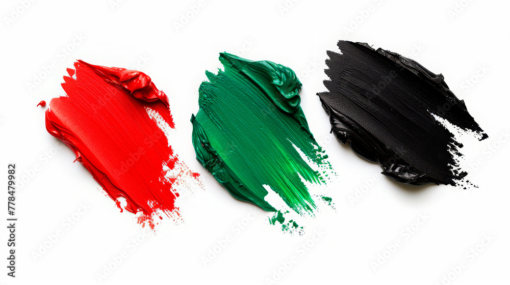 Three bold smears of paint—vibrant green, deep black, and bright red ...