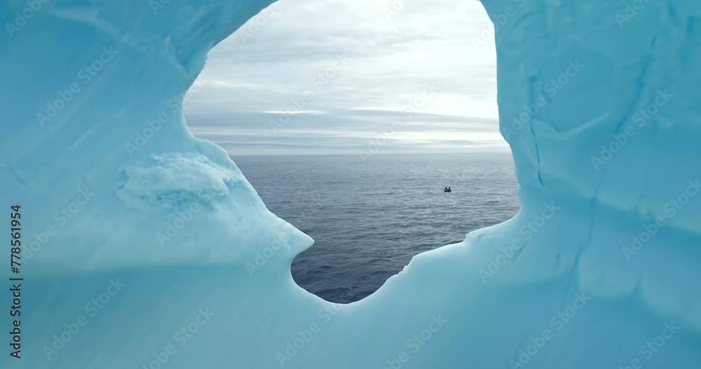 Drone fly in melted iceberg hole in Antarctica. Huge glacier melting in ...