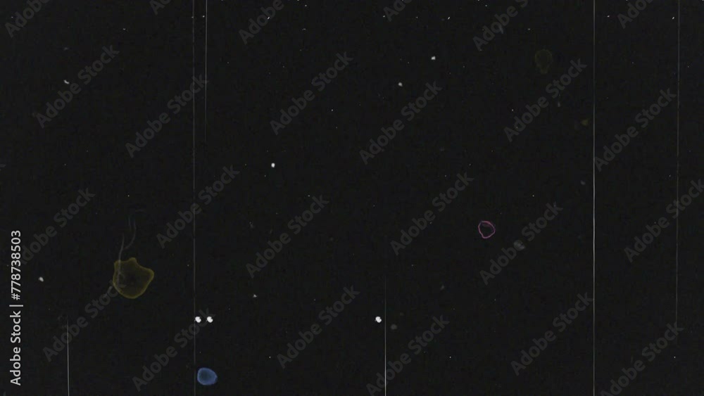 Vidéo Stock Old damaged VHS tape playing, over noise from an analog TV ...