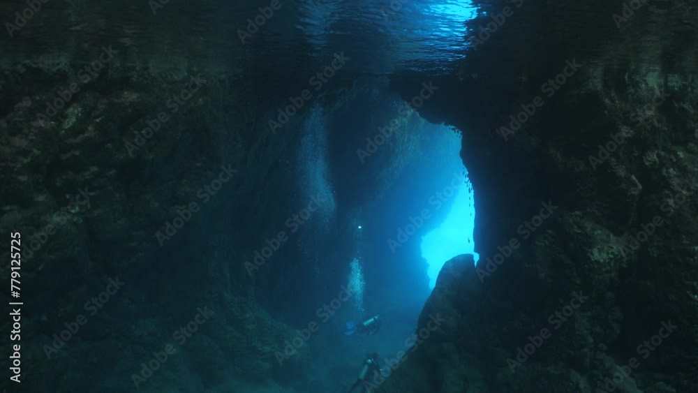 cave diving underwater scuba divers exploring caves and having fun ...
