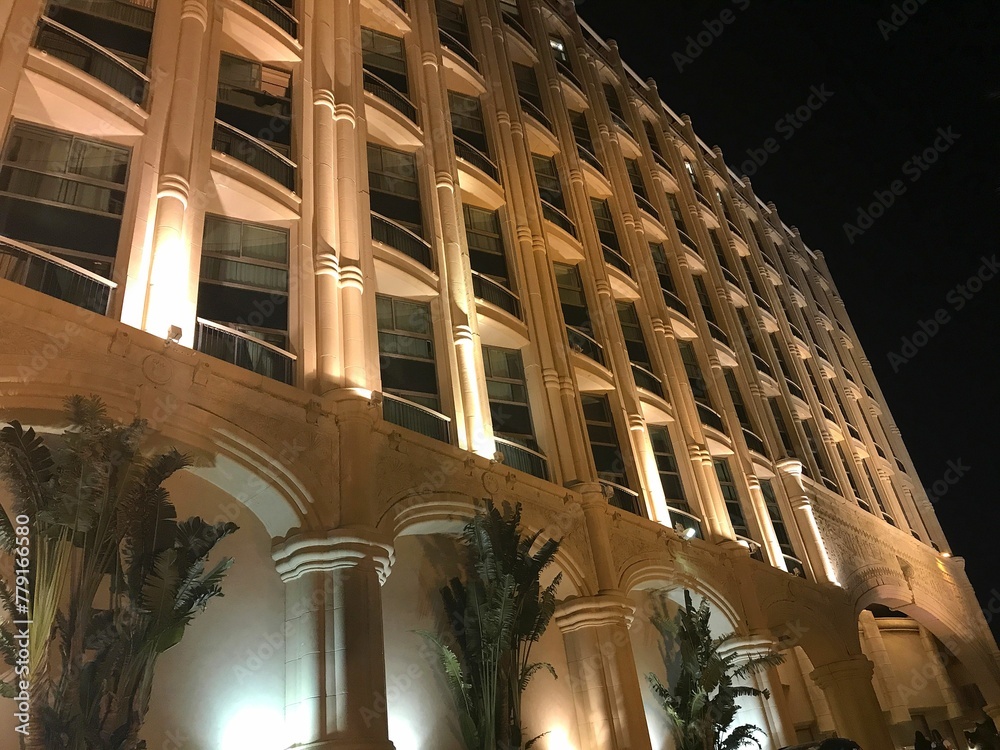Eilat, Israel- March 11, 2018: Night time exterior side view from below ...