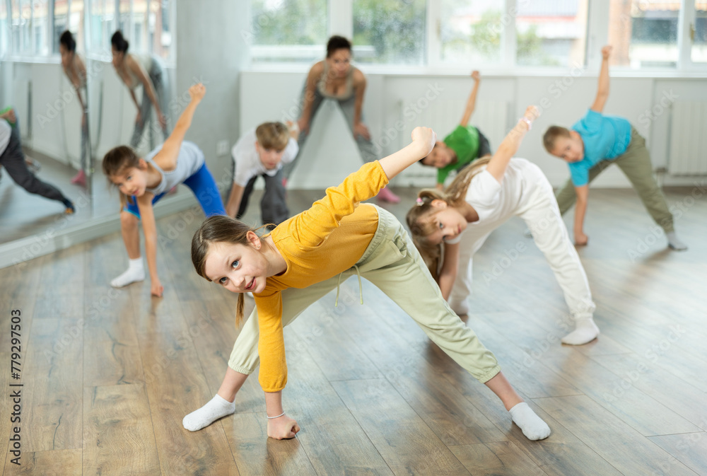 Girls with boys repeat teaches sequences of movements during training ...