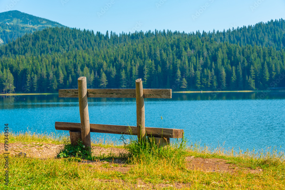 Wooden bench at the Crno Jezero aka Black lake at Durmitor national ...