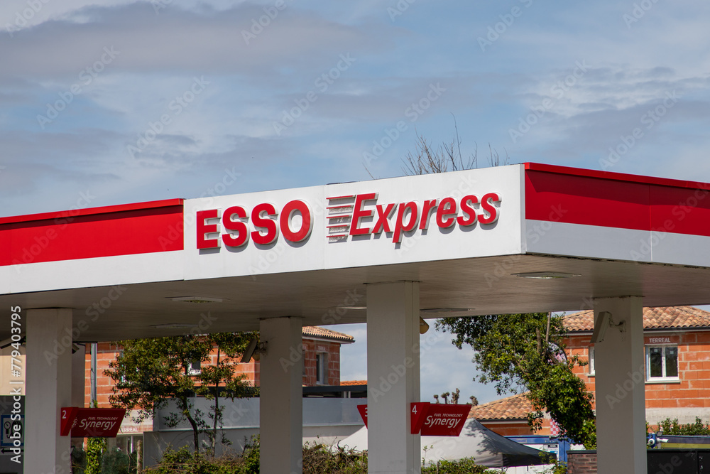 Esso Express petrol fuel station American logo text and brand sign ...