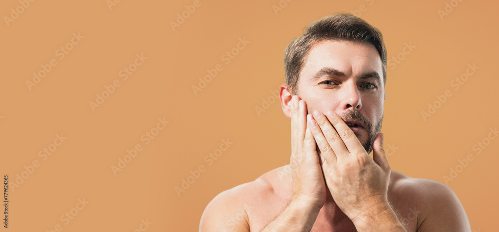 Man cosmetic, skin treatment on studio background. Hygiene and face. Matural mens cosmetics and ...