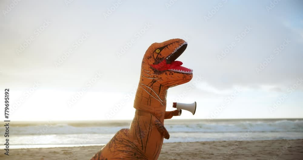 Dinosaur, costume and walking for fun in beach, megaphone and outdoor ...