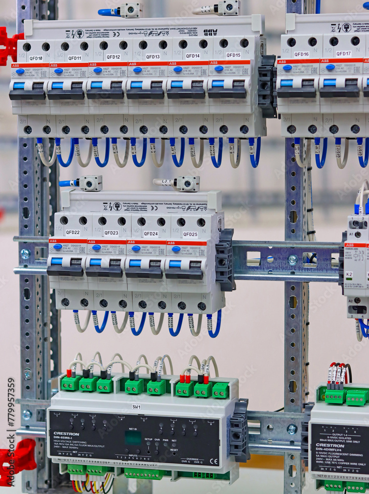 The Crestron electronic module for automatic control is installed in an ...