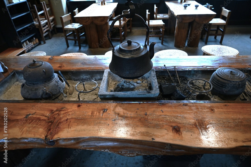 A view inside a Japanese soba restaurant that utilizes an old folk ...