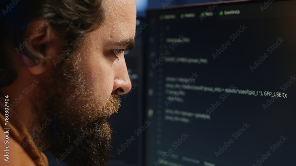 Software engineer concerned, concentrating on finding bugs while coding ... Software engineer concerned, concentrating on finding bugs while coding ...