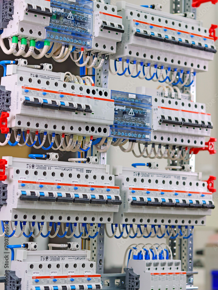 Electric current circuit breakers to protect loads in an electrical ...